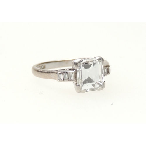 Good diamond ring, centred with a rectangular step cut natural diamond ...