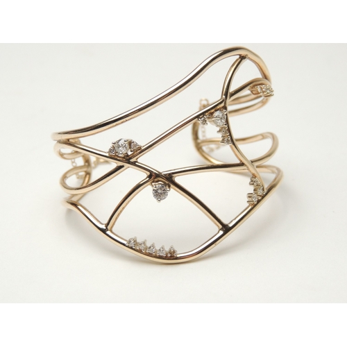 9ct gold constellation openwork bangle, set with 20 old round cut diamonds totalling approx. 0.75ct,