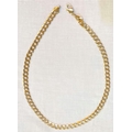 A 9ct gold yellow metal flat curb chain 47.4gms, length 51cm