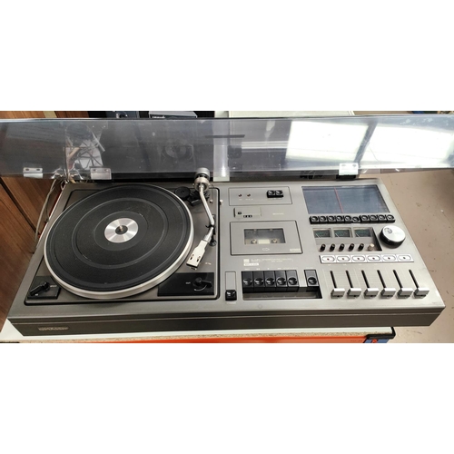 A vintage Sharp Stereo Music centre with tape deck, record deck all in ...