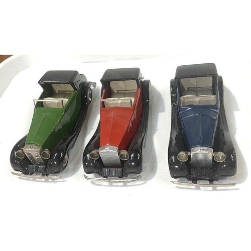 Tri-ang Minic toys: Three post war 42M clockwork tinplate cars, green ...