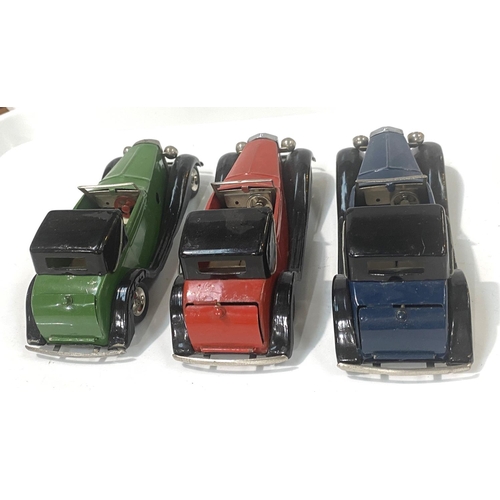 Tri-ang Minic toys: Three post war 42M clockwork tinplate cars, green ...