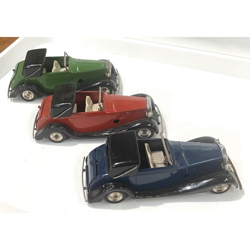 Tri-ang Minic toys: Three post war 42M clockwork tinplate cars, green ...