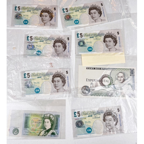 Six £5 notes (Elizabeth Fry); a £1 and 10s. note
