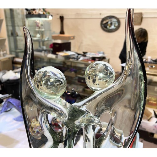 A large, heavy Murano glass sculpture, a pair of abstract clear glass ...