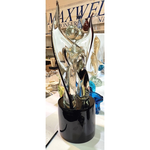 A large, heavy Murano glass sculpture, a pair of abstract clear glass ...