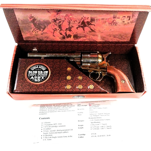 A boxed single action fast draw army Colt 45, silver and gilt with ...