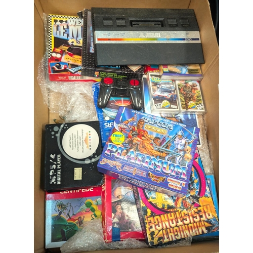 A collection of boxed retro games including Robocop 2 Commodor 64 ...