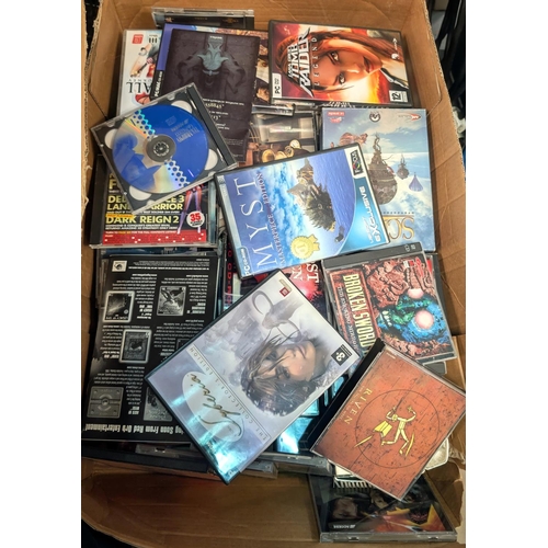 A collection of boxed retro games including Robocop 2 Commodor 64 ...