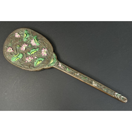A late 19th/early 20th century Chinese enamelled copper hand mirror ...
