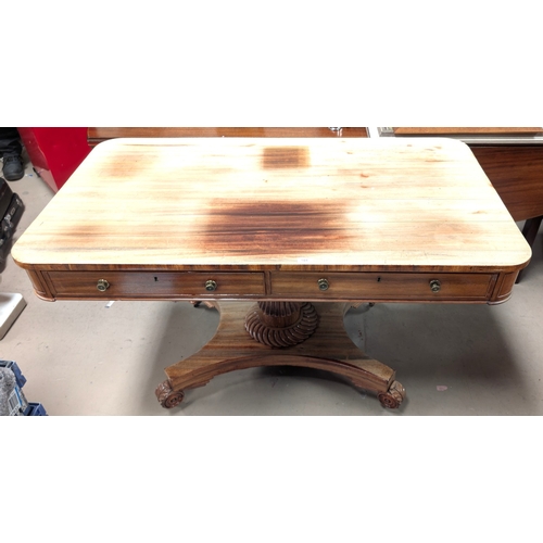 A 19th century mahogany rounded rectangular library table with 2 frieze ...