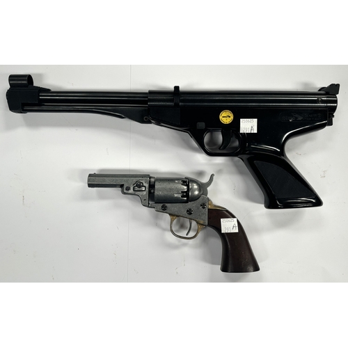 A Gamo .177 air pistol and a model of a small revolver