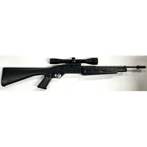 A Crosman AIR 17 .177 air rifle with a scope on the rifle by Bisley