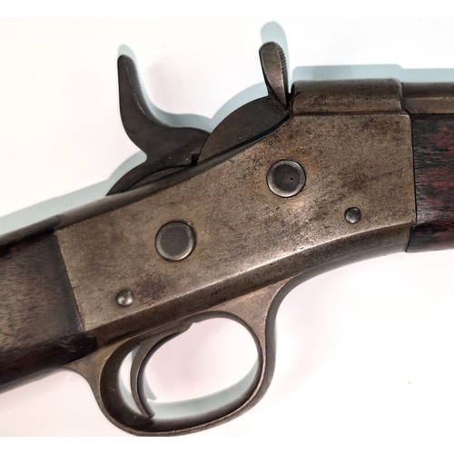 A 19th century American rifle with roll lock centre fire action ...