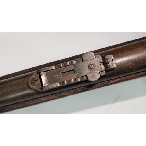 A 19th century American rifle with roll lock centre fire action ...