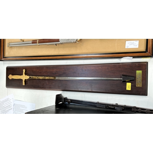 A quality reproduction gold plated Napoleon's court sword.