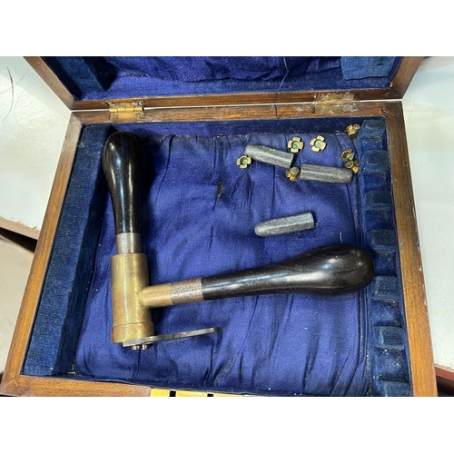 A Whitworth Pattern rifle with bullet mould and bullets, unusually ...