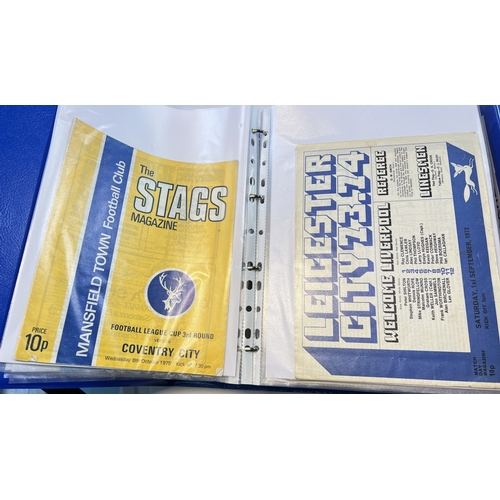 Two folders containing 1960's and 70's U K football programmes ...