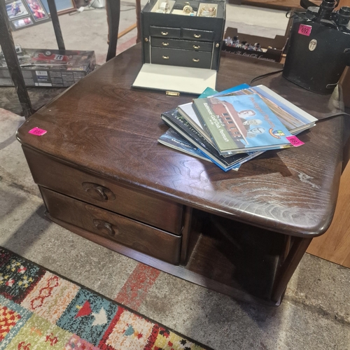 An Ercol Pandora Box Coffee Table