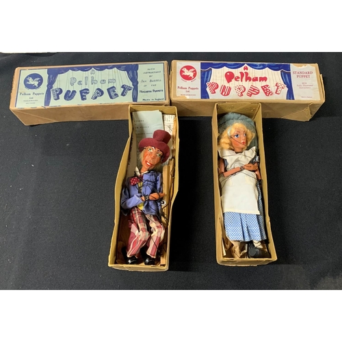 two boxed Pelham puppets