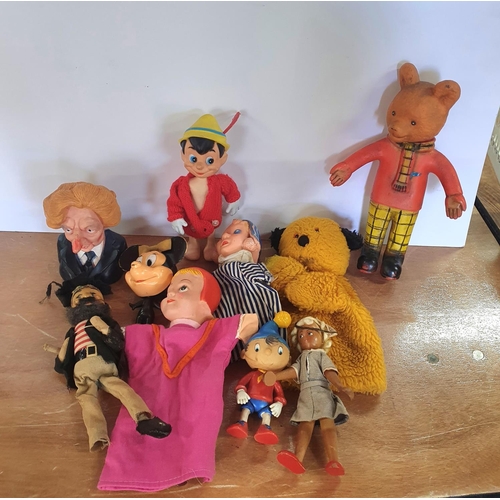 Collection of 1960s to 1990s puppets and toy figures including a Rupert ...