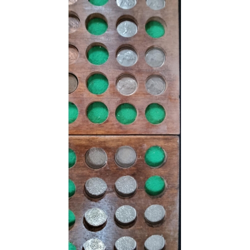 Coin set in wooden holders including Victorian bun head pennies and ...