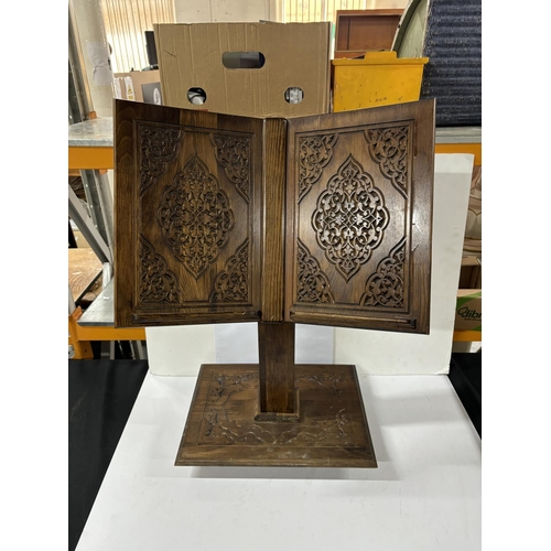 Small Wooden prayer stand, nicely carved and on wheels