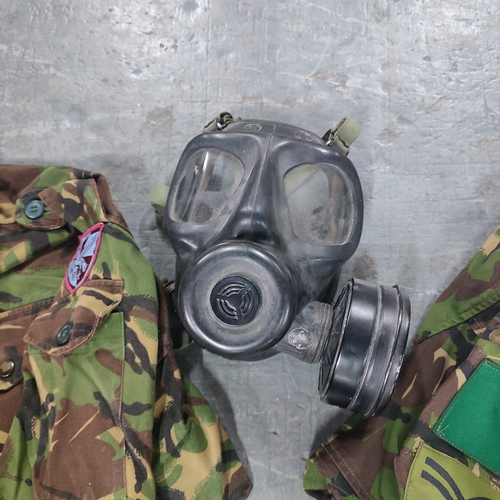 Collection of gents camouflage military uniforms Cpl. M. Hasty, and a ...