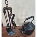 Hanging set of fire-irons etc together with an antique metal kettle (2)