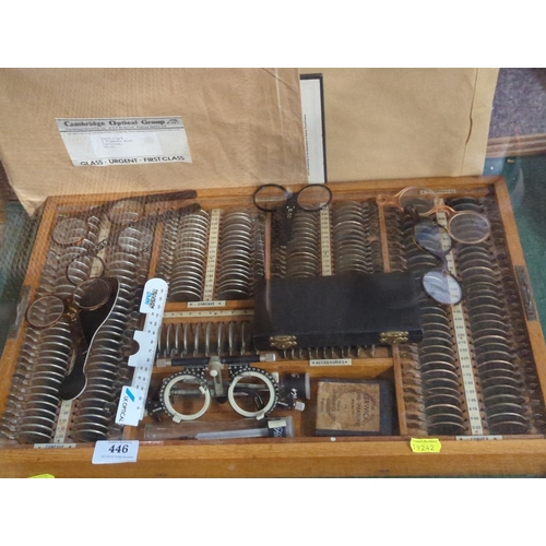 Set of optician's test lenses, test frame & accessories in oak tray ...