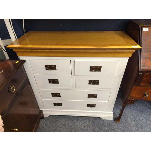 Oak topped 4 over 2 chest of drawers with drop handles. W97cm D42cm H92cm