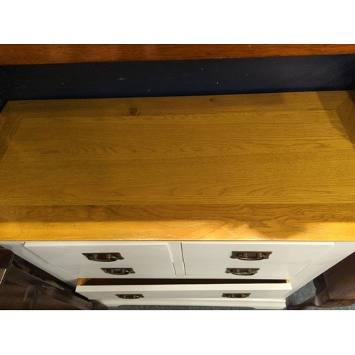 Oak topped 4 over 2 chest of drawers with drop handles. W97cm D42cm H92cm