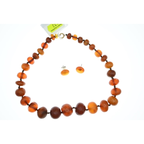 Graduated amber bead necklace, ranging from transparent to opaque ...