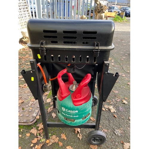 Outdoor gas barbeque on trolley with two wheels and a 5kg Calor gas ...