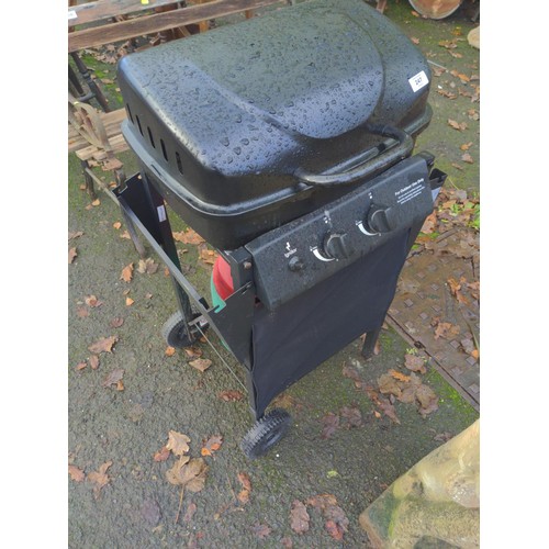 Outdoor gas barbeque on trolley with two wheels and a 5kg Calor gas ...