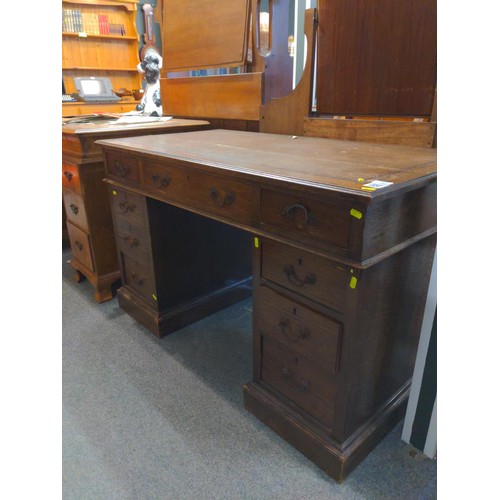 Oak pedestal writing desk. Split to top. W122cm D64cm H74cm