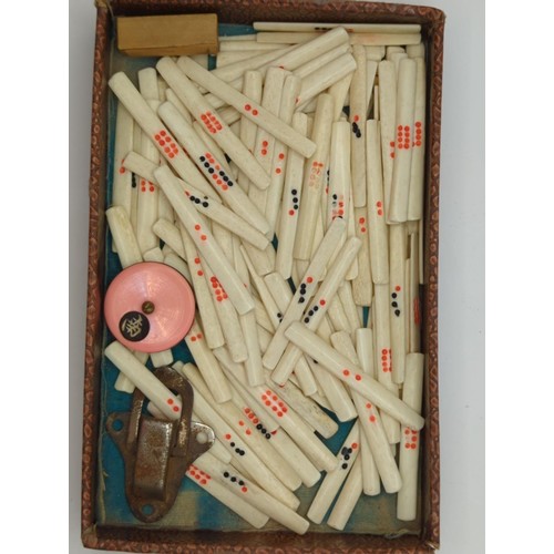 Vintage green backed Mah Jongg set with bone scoring sticks and small dice