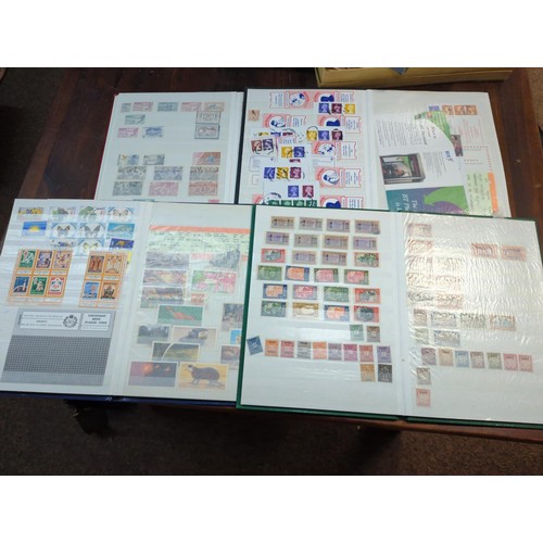 1 well filled stamp album of British stamps plus 3 other albums with ...