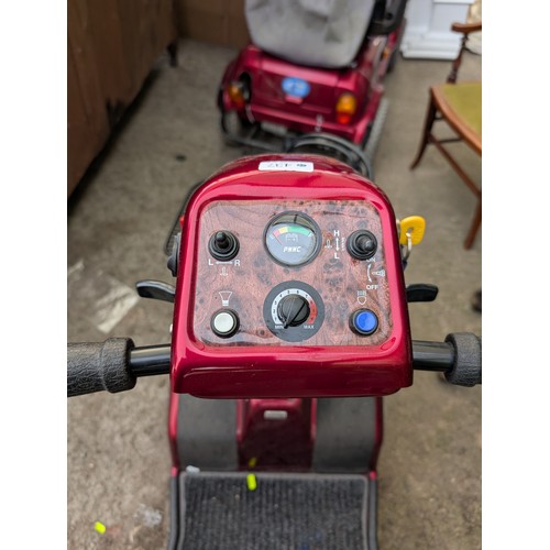 Rascal 388XL mobility scooter with keys, charger and paperwork.