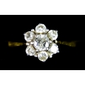 An 18ct Gold Diamond Flower Head Ring, set with brilliant cut diamonds ...