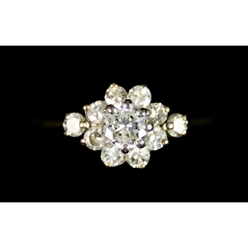 A Diamond Flower Head Ring, set with approximately 0.50ct of old ...