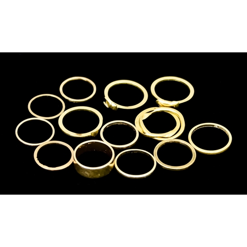 Thirteen Misshapen Gold Bands, unfinished, each tests as 9ct gold or ...