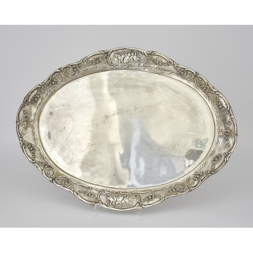 A Continental Silver Oval Tray,Â stamped 800 standard, with scroll moulded rim, the border embossed
