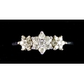 A Platinum Diamond Triple Flower Head Ring, set with small brilliant ...
