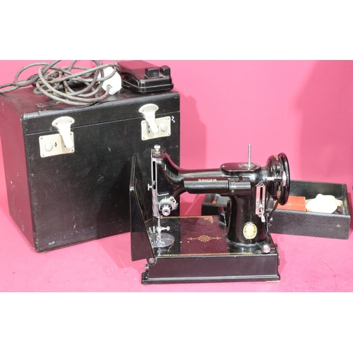 Singer Manufacturing Co. portable sewing machine complete with foot ...