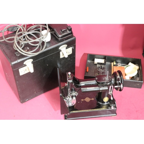 Singer Manufacturing Co. portable sewing machine complete with foot ...
