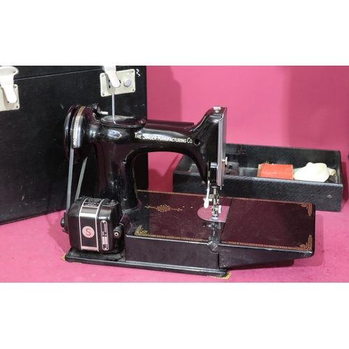 Singer Manufacturing Co. portable sewing machine complete with foot ...