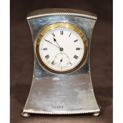A Birmingham silver tabletop timepiece with white enamel dial (working ...
