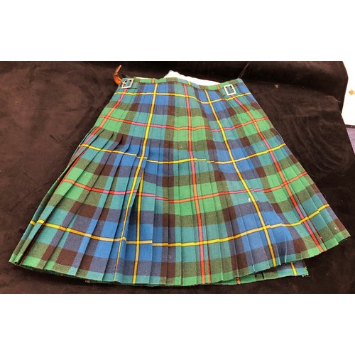 A Scottish kilt with Kiltmakers (Inverness) ltd label, 50cm long, waist ...
