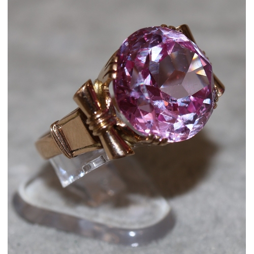 A gold ladies' ring set with centre large pink stone, Size R, 8 grams gross
